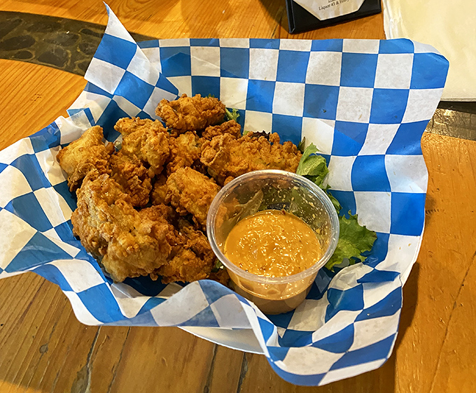 These aren't just fried oysters; they're little crispy treasures from the sea, perfectly complemented by house-made dipping sauces.