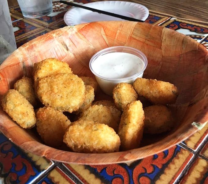 Fried pickle chips: proof that anything becomes magical when battered and introduced to hot oil. The perfect tangy counterpoint to burger richness.