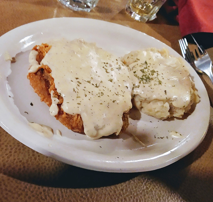 Country-fried steak smothered in gravy that would make your grandmother both proud and a little jealous. Comfort food that earned its diploma.