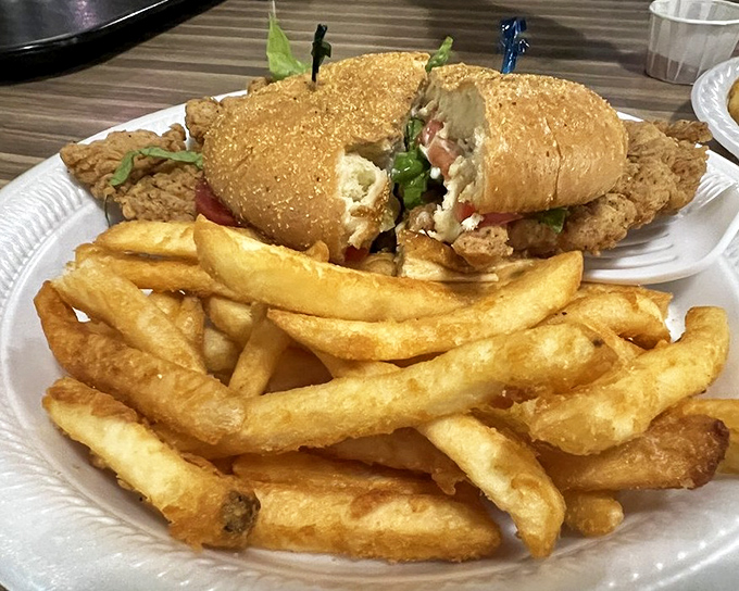 Sandwich architecture at its finest. This isn't just lunch&mdash;it's structural engineering with crispy edges and a soft bun that deserves an award.
