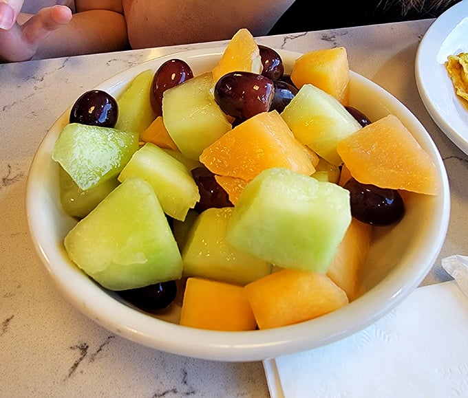 Fresh fruit that didn't come from a can marked "fruit cocktail." A simple bowl of sunshine that somehow tastes better in a diner than anywhere else.
