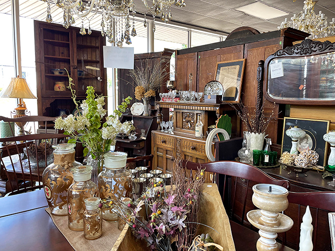 Elegant furniture from bygone eras shares space with crystal and dried flowers, creating vignettes that could inspire your next home makeover.