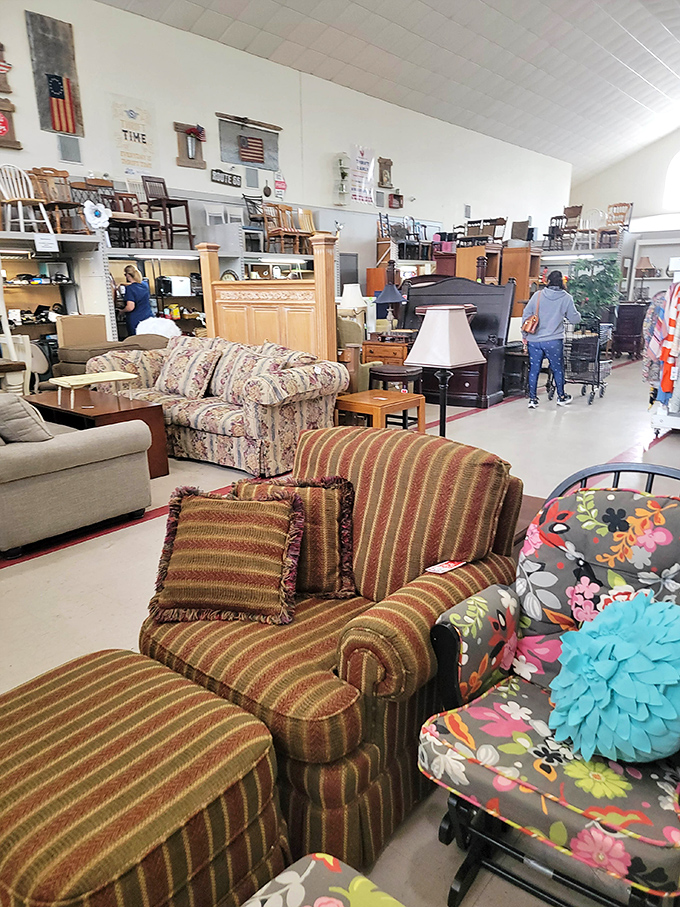The furniture section: where that perfect striped armchair waits patiently for someone to recognize its potential as the missing piece in their living room.