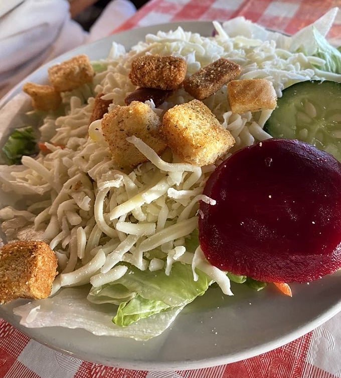 Even the garden salad gets special attention, with crisp vegetables, homemade croutons, and that perfect balance of simplicity and satisfaction.