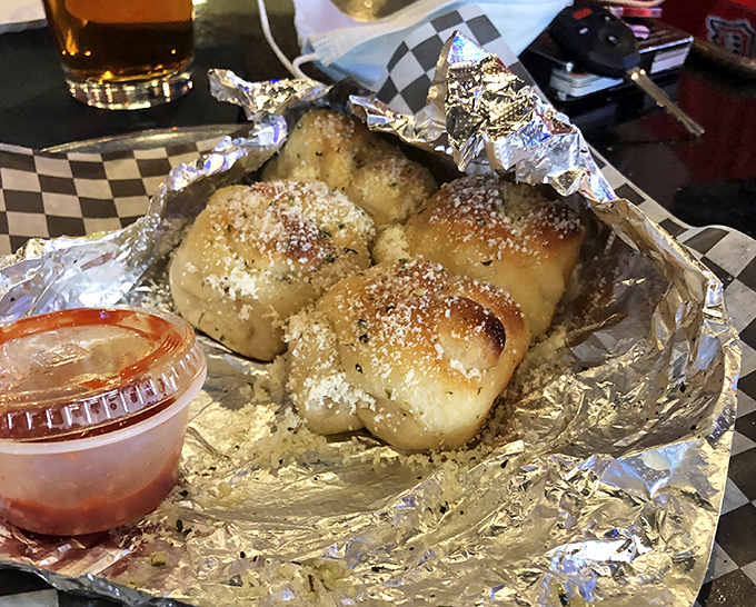 Garlic rolls that could make a vampire reconsider their life choices. Worth every bit of the social distancing that might follow.