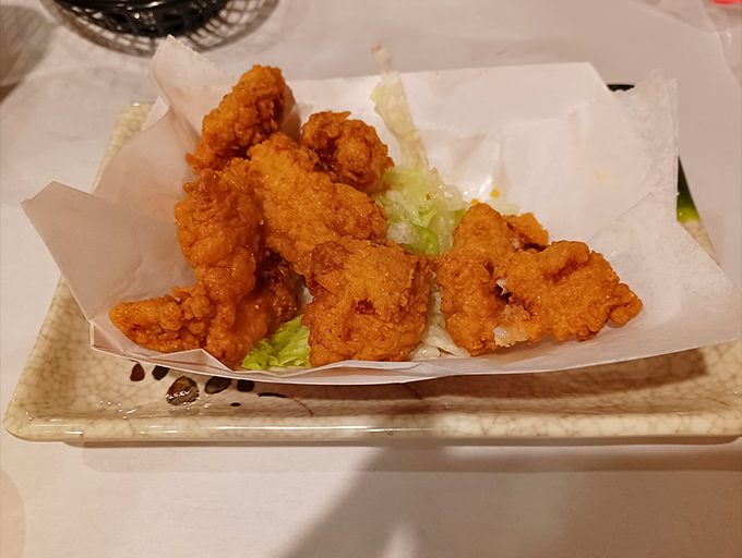 Golden-fried goodness served on a bed of lettuce&mdash;crispy on the outside, tender within, and impossible to share.