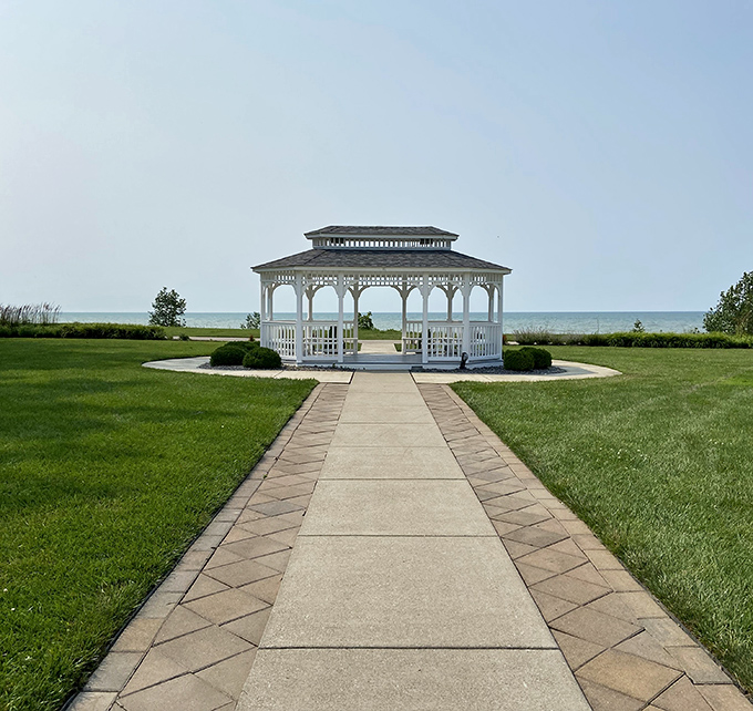 The gazebo stands like a wedding cake topper on Geneva's lush lawn—a spot where proposals are made, vows exchanged, and ice cream inevitably dripped.