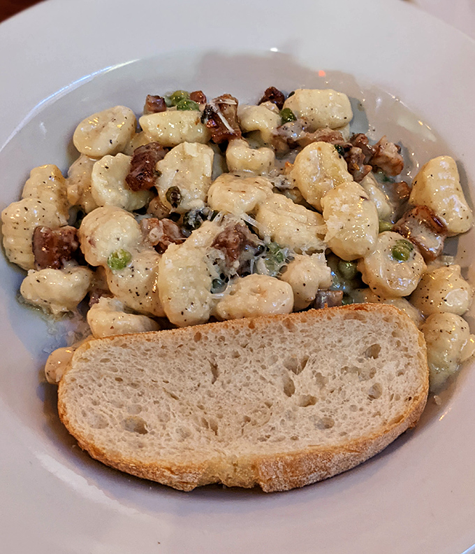 Gnocchi carbonara with toasted pecans &ndash; comfort food that's dressed up for a night out but still remembers where it came from.