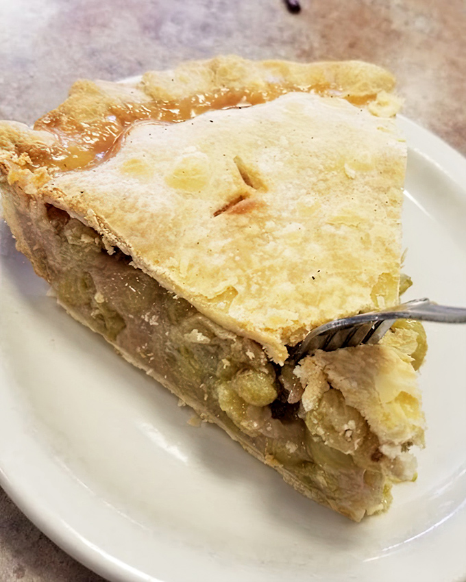 Gooseberry pie that your grandmother would approve of &ndash; flaky crust, tangy filling, and enough nostalgia to make you misty-eyed between bites.