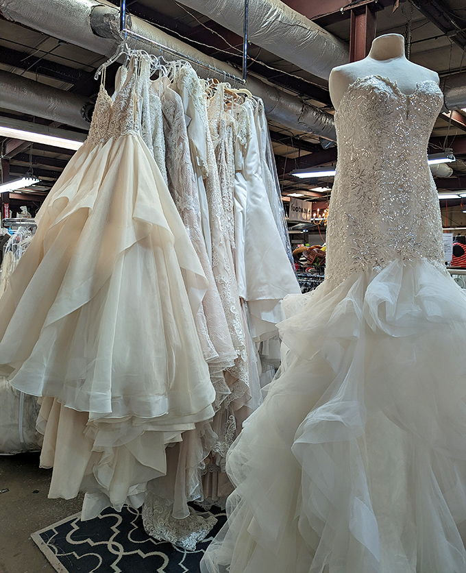 Wedding gowns that could make a second trip down the aisle, their intricate beadwork and flowing fabrics preserved for new love stories.