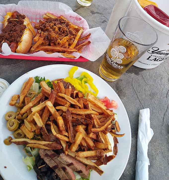 The holy trinity of comfort food: loaded fries, a hearty sandwich, and a cold beer. Suddenly, Monday doesn't seem so bad.