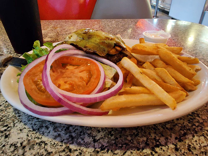 This isn't just a burger &ndash; it's a perfectly constructed tower of fresh ingredients that demands both hands and several napkins.