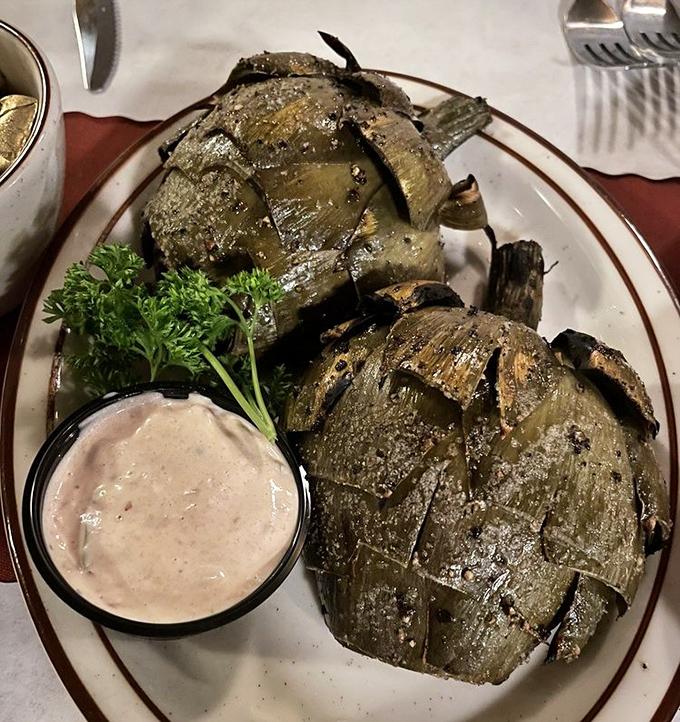 Grilled artichokes: proof that vegetables can be just as crave-worthy as meat when treated with respect and fire. That dipping sauce should be illegal.