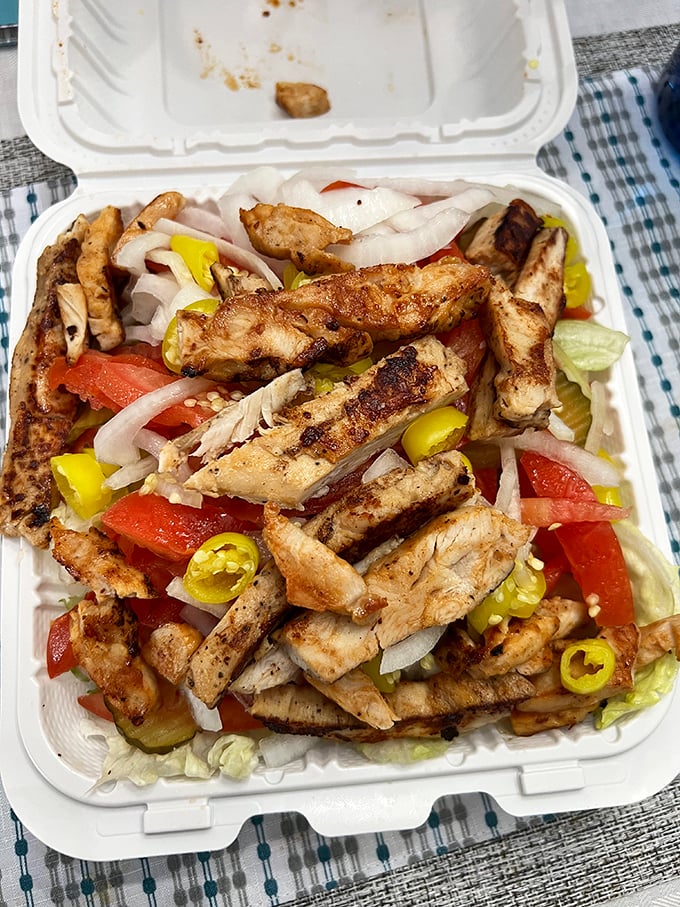 When you want to pretend you're being healthy while still enjoying every bite, this grilled chicken salad with its pop of yellow peppers delivers guilt-free satisfaction.