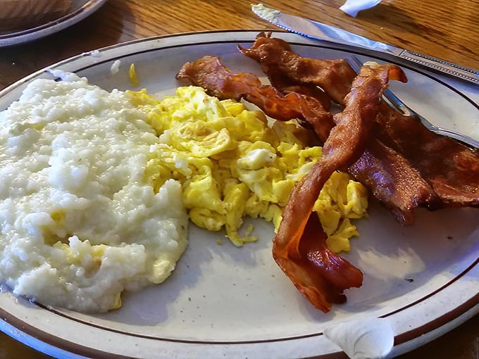 Creamy grits, perfectly cooked eggs, and bacon with just the right balance of crisp and chew&mdash;the holy trinity of Southern breakfast.