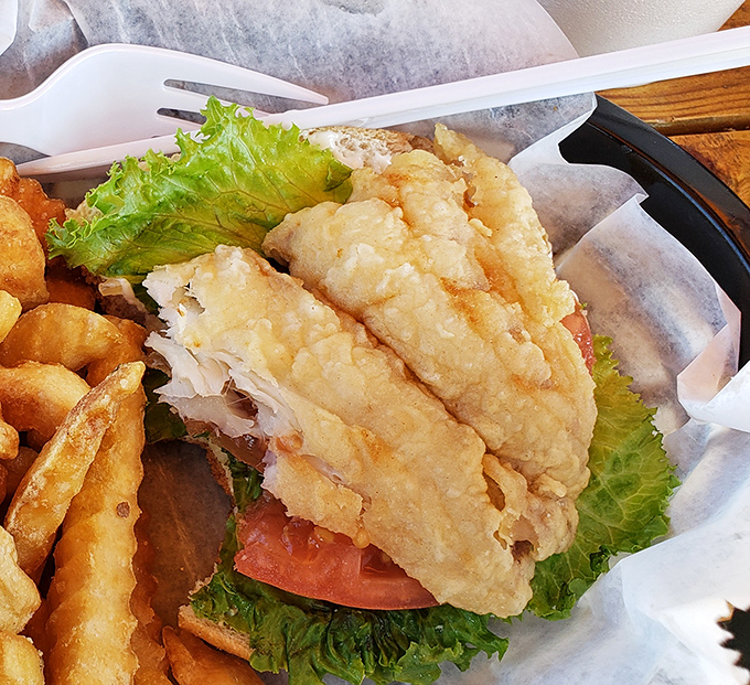 This fish sandwich isn't just a meal, it's an event. Crispy, flaky, and fresh enough to make you consider moving to Destin permanently.