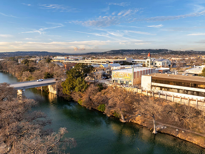 The Guadalupe River winds through town like a liquid ribbon, creating a scenic backdrop for Kerrville's downtown area.