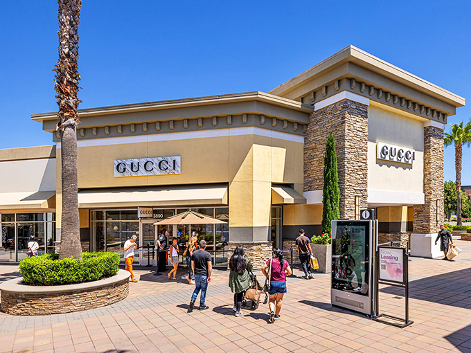 The Gucci storefront beckons like a siren song to label-lovers. Those palm trees aren't just decoration&mdash;they're there to fan you when you faint at the discounts.