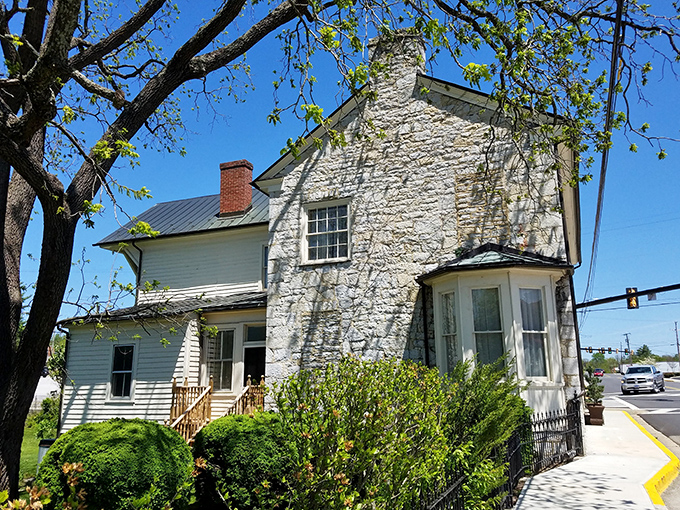 The historic Haller-Gibboney Rock House blends stone and clapboard architecture, a testament to the craftsmanship that $1,300 monthly won't buy nowadays.