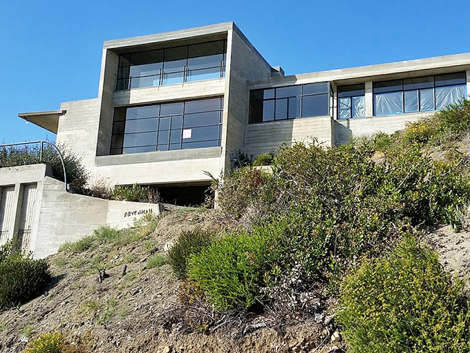 Modern architecture clings to Laguna's hillsides like elegant barnacles, proving that humans and nature can coexist in stylish harmony.