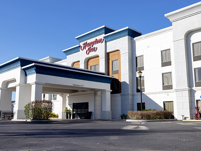 The Hampton Inn stands ready for visitors, a modern comfort station for weary travelers exploring Florida beyond the theme parks and beaches.