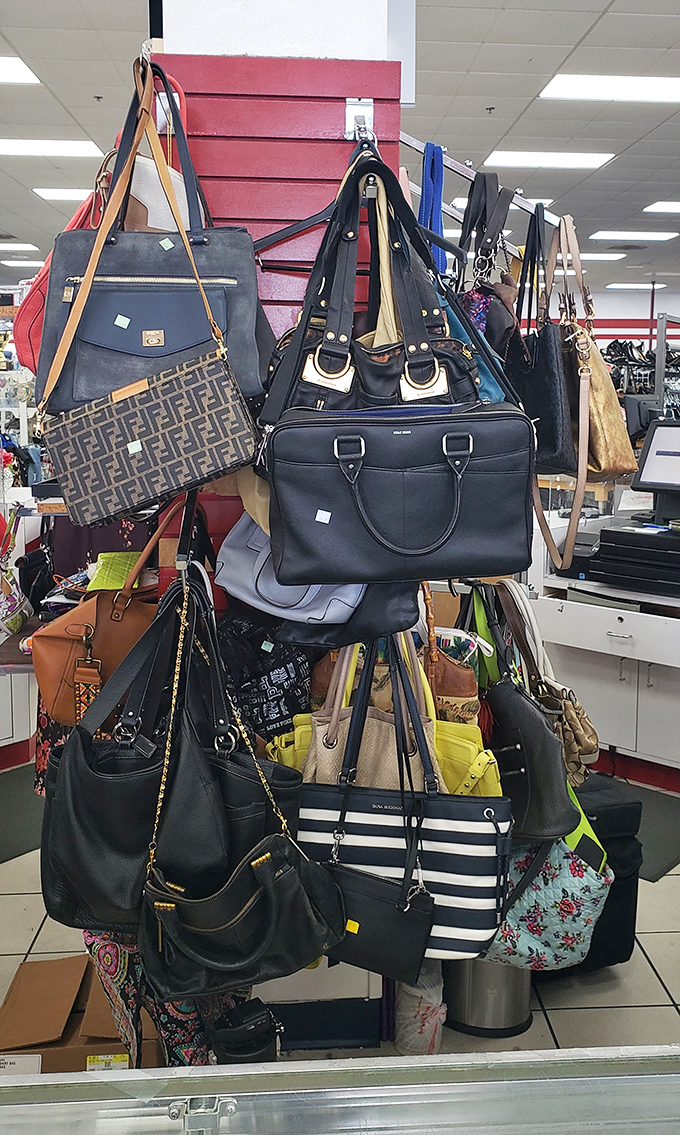 Handbag heaven or purse purgatory? Designer lookalikes mingle with authentic treasures in this hanging garden of accessories. Spot the Fendi pattern peeking through!