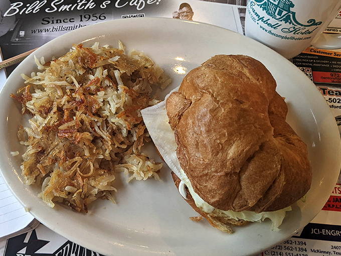 When a biscuit looks this proud sitting next to perfectly crisped hash browns, you know you're in a place that respects breakfast traditions.