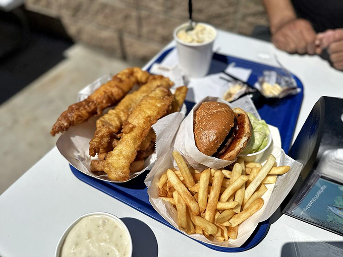 The holy trinity of fish, burger, and fries&mdash;a coastal California communion that satisfies both land and sea cravings in one glorious tray.