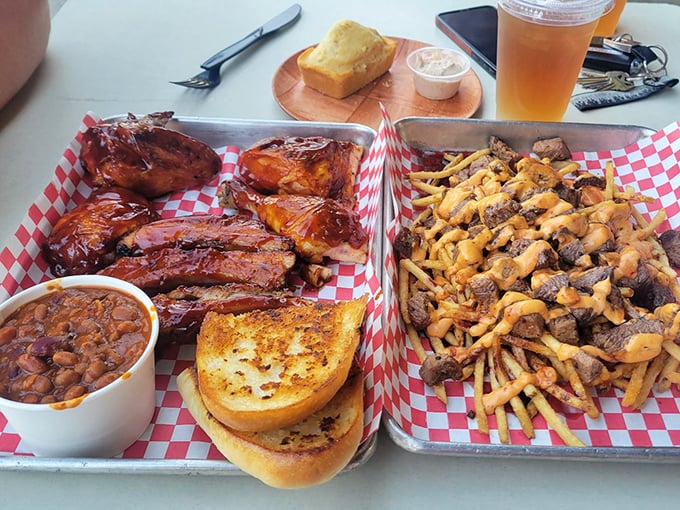 A tray that answers the eternal question: "But what if I want to try everything?" Baked beans, garlic bread, and meat that's been kissed by fire.