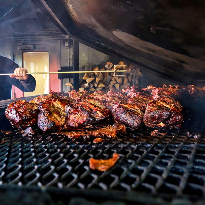 Where there's smoke, there's flavor. The pitmaster's craft on display is barbecue ballet in slow motion.