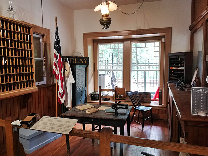 This meticulously recreated post office corner feels like stepping into a Norman Rockwell painting&mdash;America's past preserved in warm wood tones.