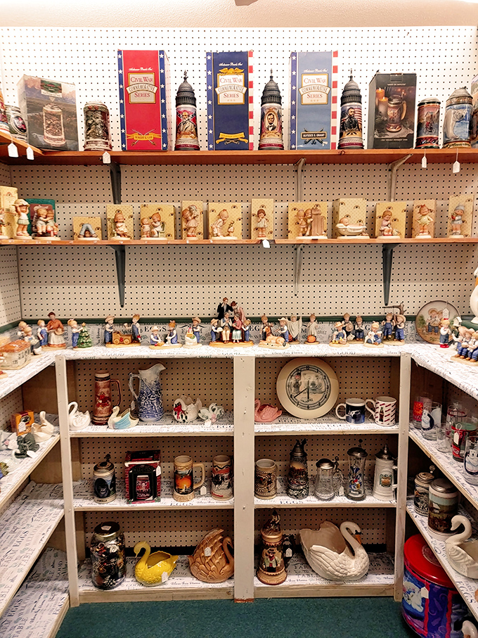 Beer stein heaven meets collectible figurine paradise. This corner alone could keep a collector happily hunting for hours.