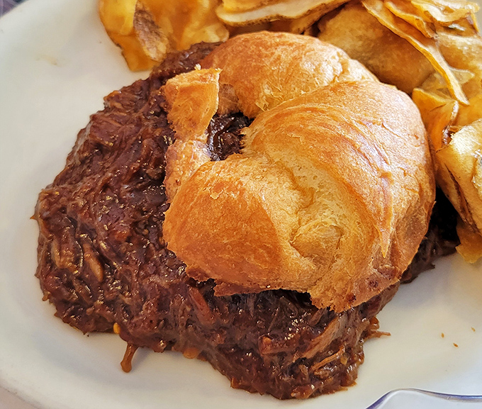 Hot beef sandwich &ndash; the unsung hero of diner cuisine. Tender meat nestled on a pillowy bun, ready to transport you to simpler times.