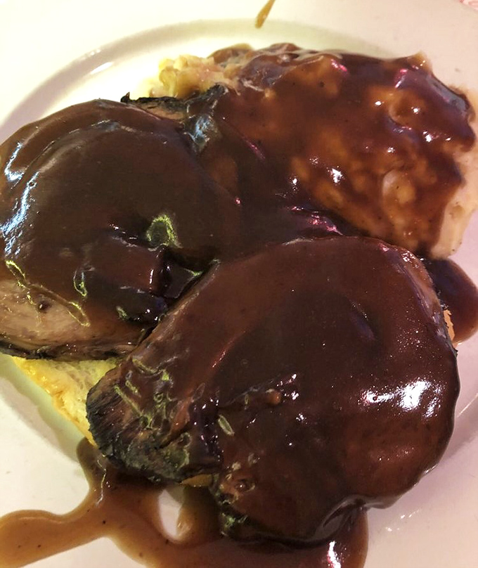 This hot roast beef sandwich isn't just covered in gravy&mdash;it's swimming in a pool of happiness that would make synchronized swimmers envious.