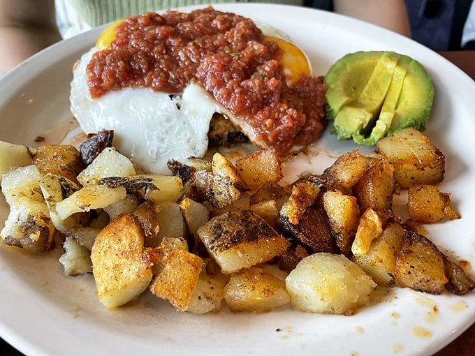 Huevos Rancheros that bring a fiesta to your morning, complete with avocado slices that look like they were carved by angels.