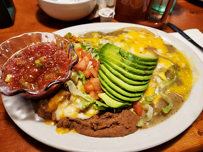 Southwestern breakfast artistry &ndash; where avocado fans, salsa enthusiasts, and cheese lovers find common ground in a plate that screams "Buenos d&iacute;as!"