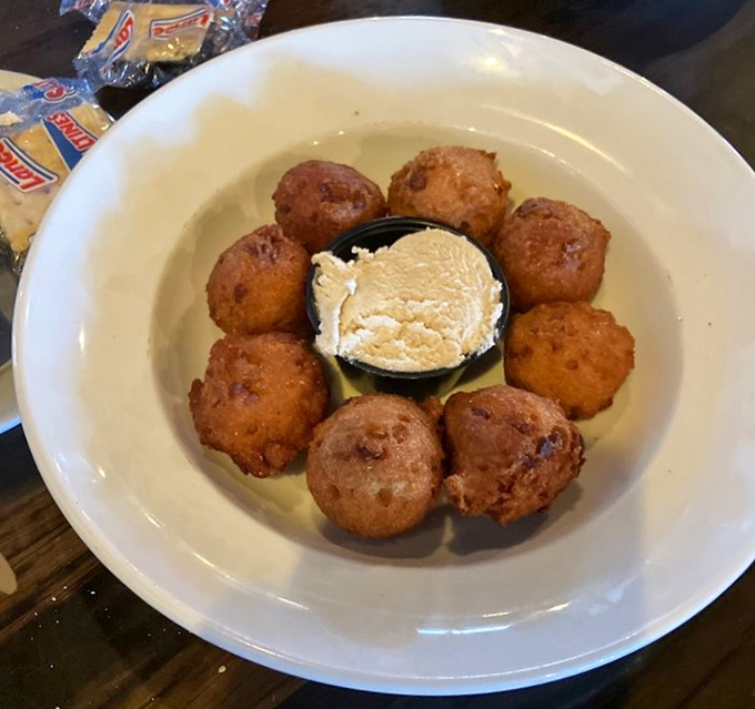 Hush puppies at Walt's are the supporting actors that steal the show &ndash; golden orbs of cornmeal joy that demand a starring role on your plate.