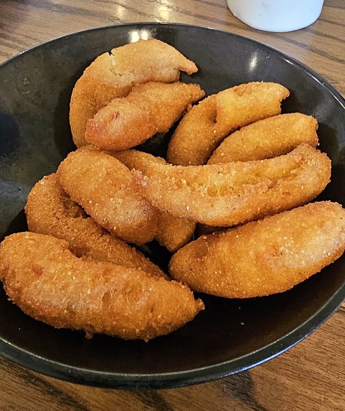 Hushpuppies so golden they belong in Fort Knox. These cornmeal treasures are what Southern dreams are made of.