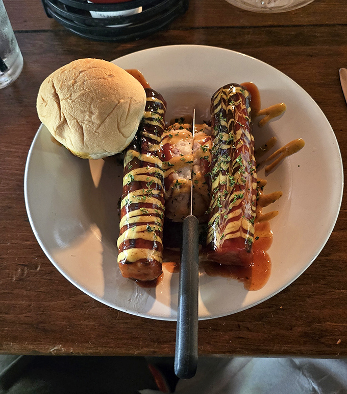 Sausages with artistic flair! These beautifully grilled links prove that sometimes the best canvas is a simple white plate.