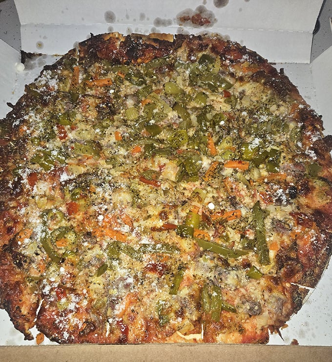 When Italian beef meets pizza, it's like Chicago's culinary soul found its perfect expression. The giardiniera adds just enough kick.