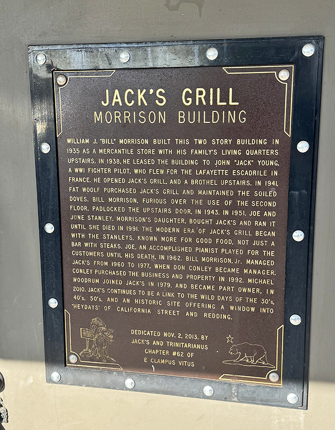 Jack's historical plaque tells tales of wartime pilots, family recipes, and decades of steakhouse perfection.