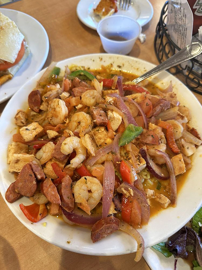 This jambalaya isn't just a dish&mdash;it's a spicy celebration where shrimp, sausage, and chicken throw the kind of party your taste buds talk about for days.