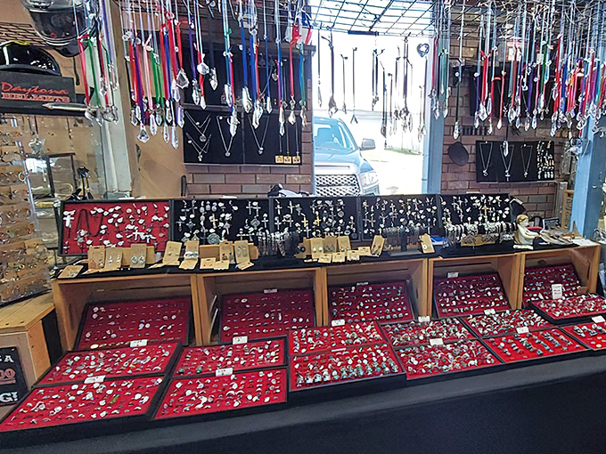 Treasure trove of glittering possibilities where vintage pendants and modern pieces share space like a multigenerational jewelry family reunion.