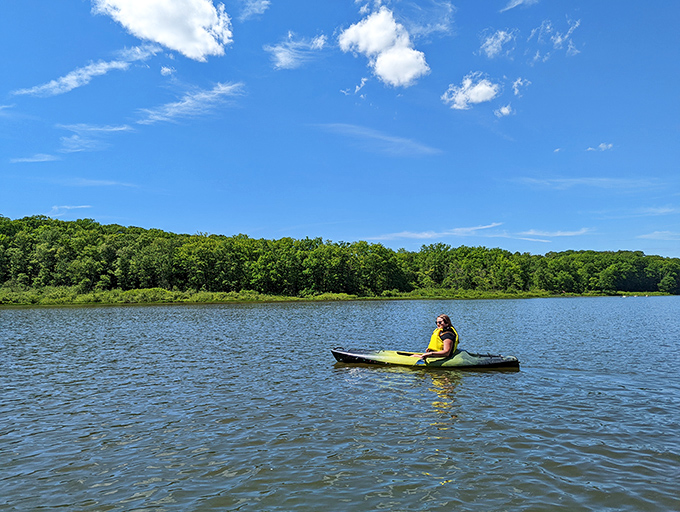 Solo kayaking on mirror-calm water beats any meditation app you've downloaded this year.