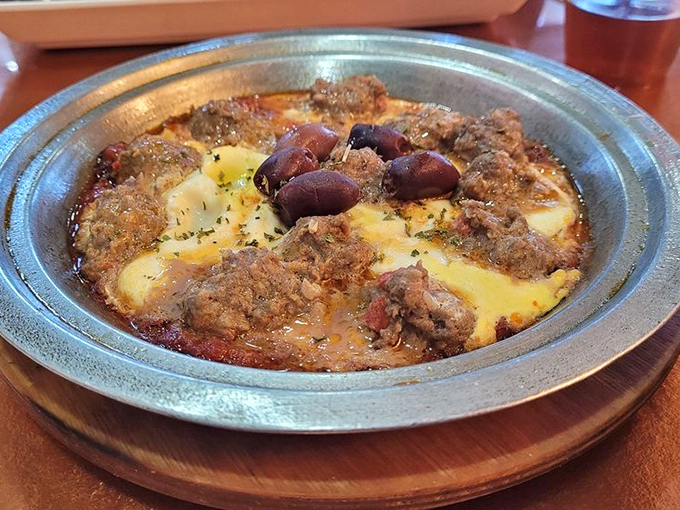 The Kefta Tagine arrives bubbling with promise&mdash;seasoned meatballs swimming in a rich tomato sauce with eggs that have poached to creamy perfection.