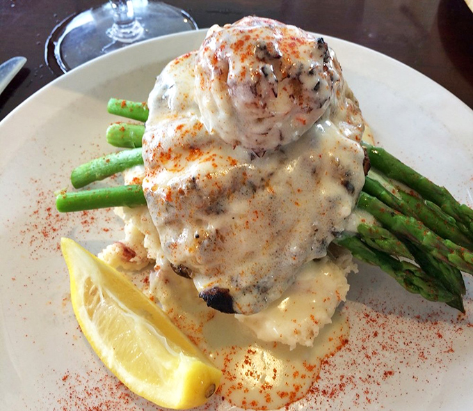 The only snowdrift Floridians welcome—creamy sauce cascading over fresh-caught grouper with a sprinkle of paprika for good measure.
