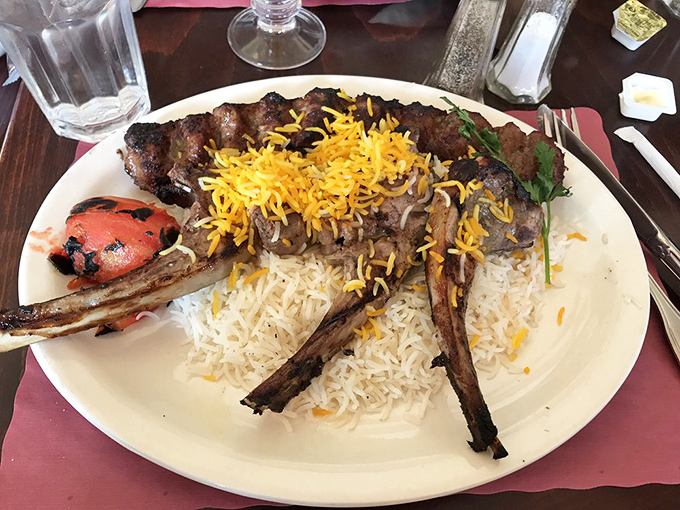These lamb chops aren't just cooked, they're respected. Perfectly charred exterior giving way to tender meat, served atop a mountain of fragrant rice.