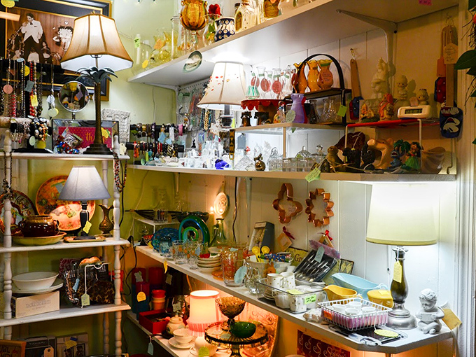 Lamps illuminate treasures like archaeological discoveries. That fire engine pedal car would've been my childhood dream vehicle.