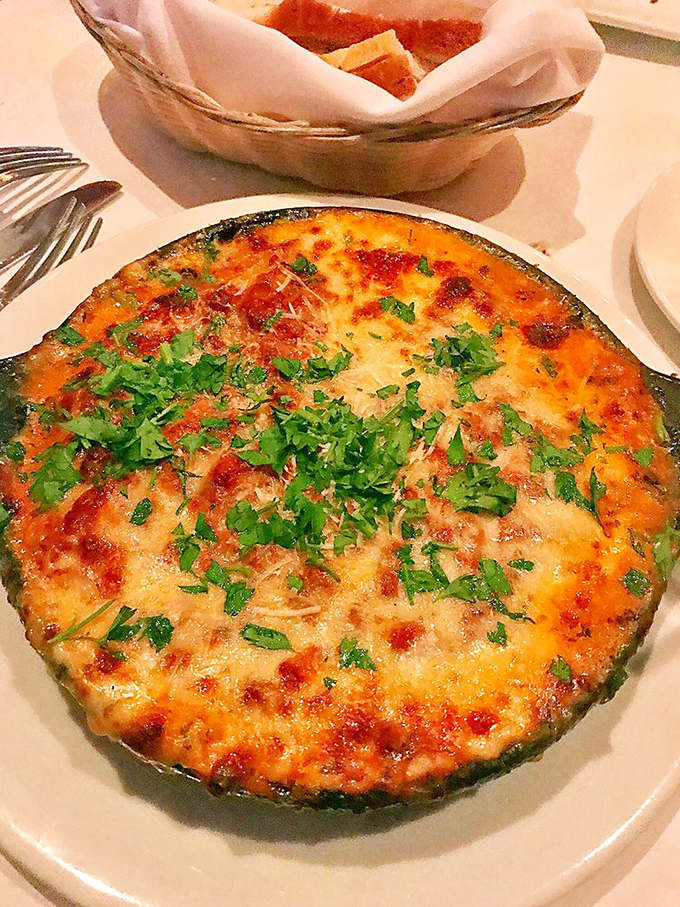 Bubbling cheese, bright herbs, and a perfectly browned crust—this dish proves that sometimes the simplest combinations create the most profound flavors.