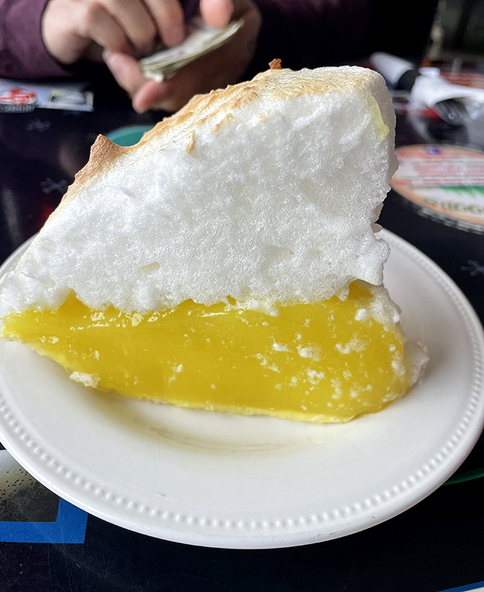 Lemon meringue pie with a mile-high cloud of sweet meringue floating above tangy lemon filling&mdash;dessert architecture at its finest.